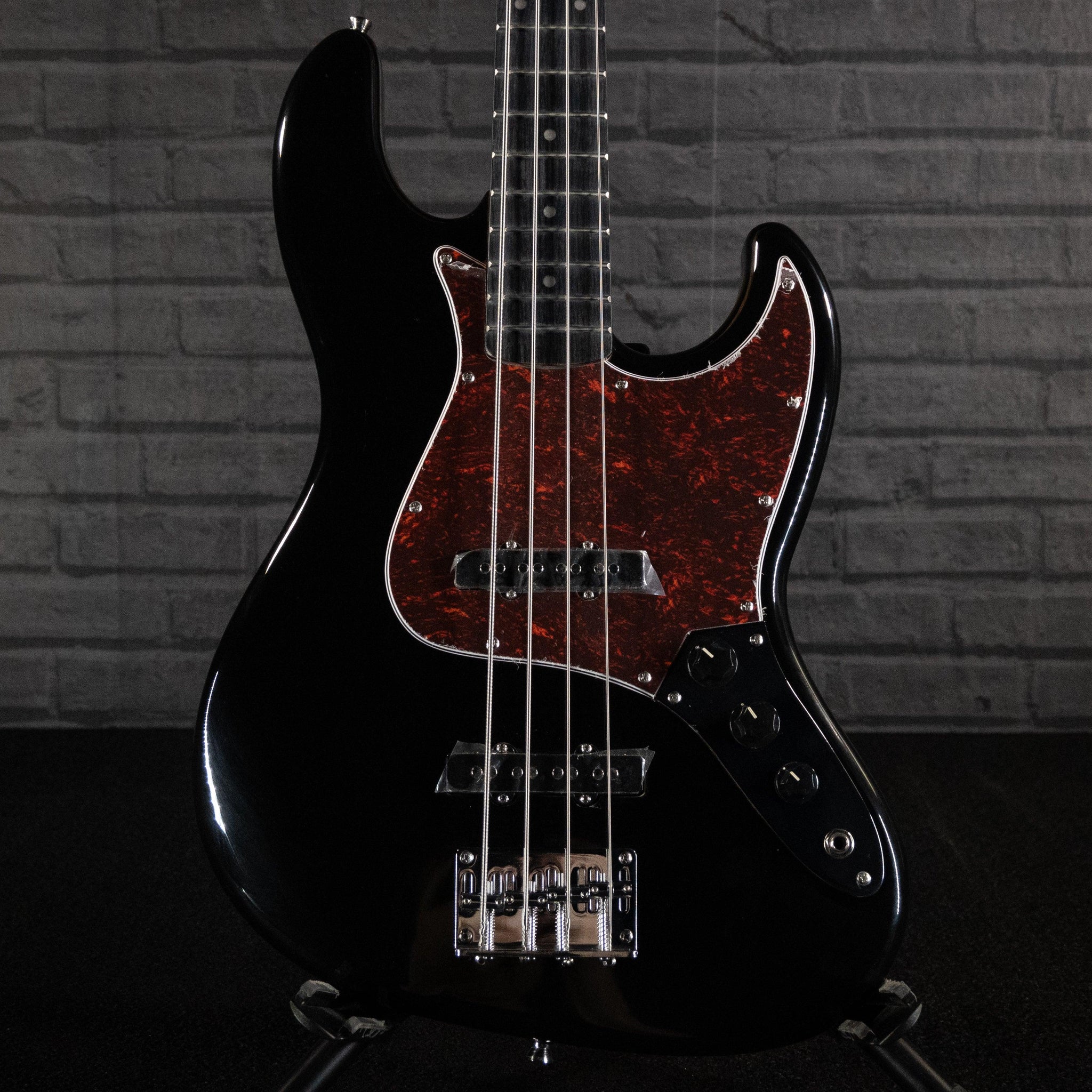 Tagima TW-73 4-String Electric Bass Guitar (Black w/ Tortoise Shell Pi